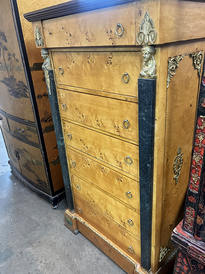 This isn't just a dresser&mdash;it's a time machine crafted from burl wood and brass that whispers tales of grand estates.