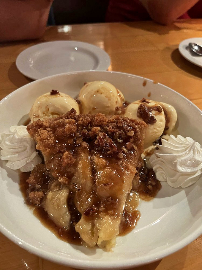Apple crisp that makes you nostalgic for grandma's kitchen, even if your grandma couldn't cook. Those three scoops of vanilla ice cream know their role.