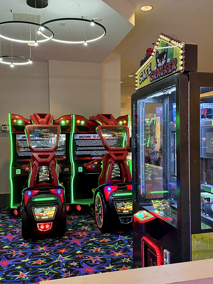 The arcade&mdash;where parents' shopping stamina gets a second wind while kids burn energy on racing games. Everybody wins.