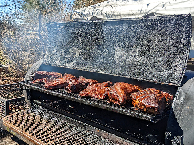 The holy grail of barbecue &ndash; a proper smoker doing its low-and-slow magic. This isn't cooking; it's meat alchemy happening before your eyes.