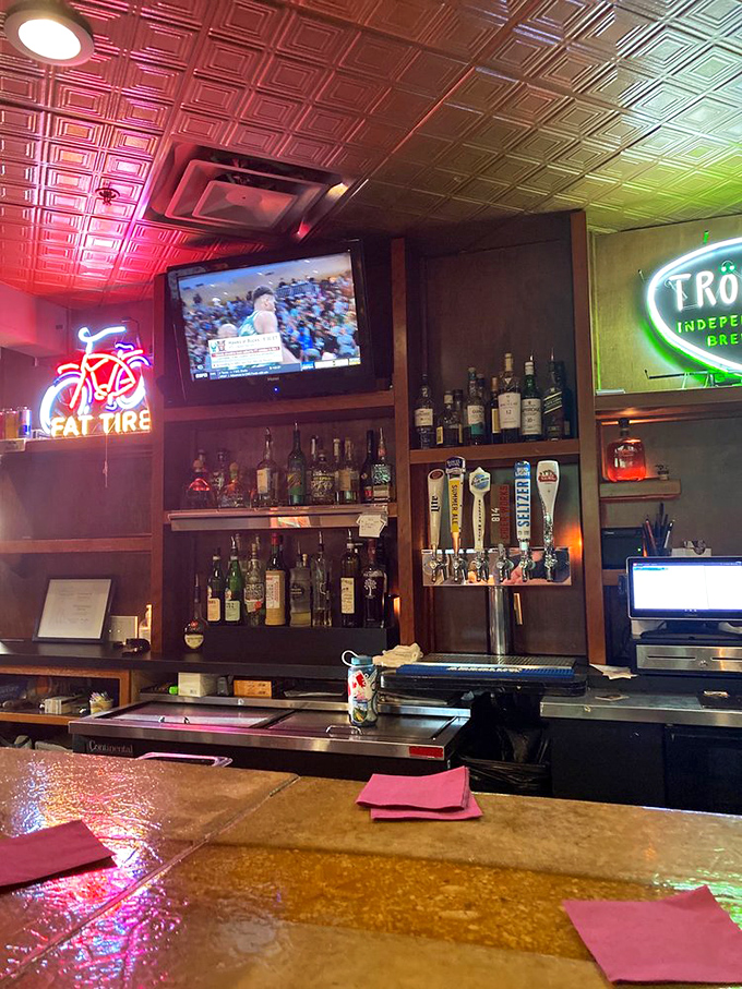 The bar at Kelly's isn't just where drinks are mixed&mdash;it's command central for conviviality, with local brews on tap and spirits lined up like old friends.