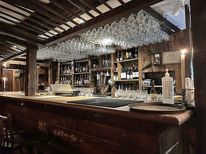 The tavern bar doesn't just serve drinks&mdash;it serves history, with wooden beams overhead and glassware that catches candlelight like liquid stars.
