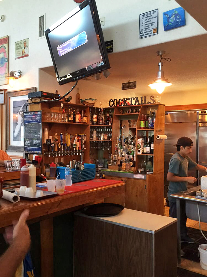 The bar stands ready for thirsty sailors and landlubbers alike, promising cold drinks with a side of local fishing tales.