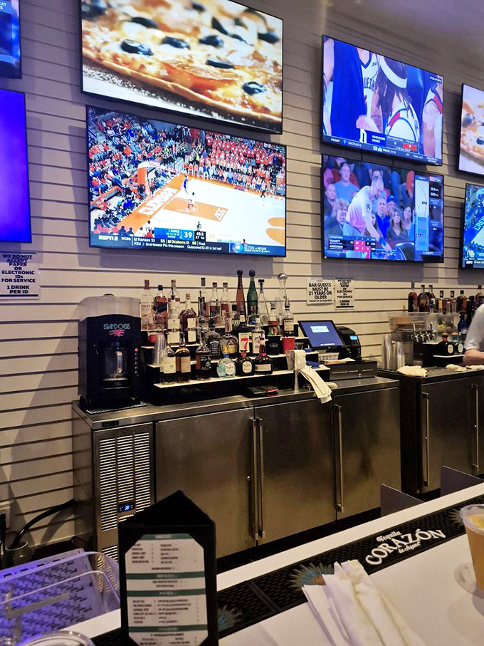 The bar at Shunk Gulley &ndash; where sports fans and cocktail enthusiasts find common ground. Those TVs aren't the only things with good reception.