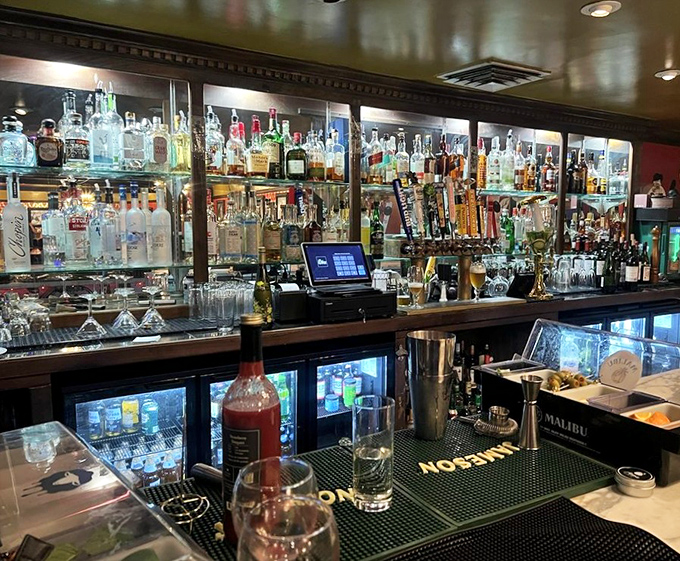 A bar stocked so completely it looks like it's preparing for Prohibition 2.0. Your grandfather would approve of the whiskey selection.