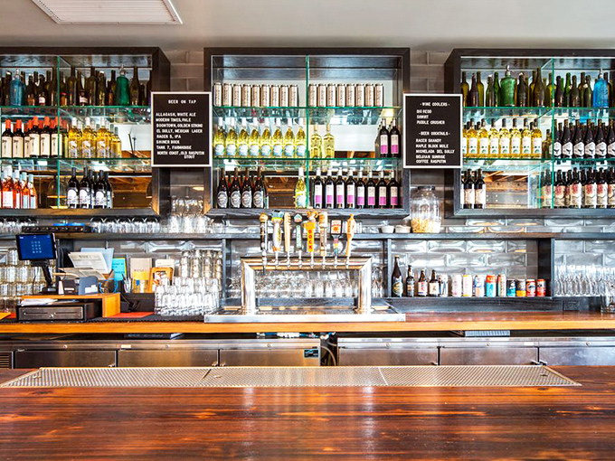 A bar stocked for serious business &ndash; because nothing complements slow-smoked meats quite like a thoughtfully selected bourbon or craft beer.