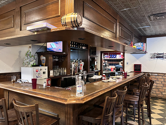 The bar area isn't trying to be trendy&mdash;it's aiming for timeless. That wooden barrel accent isn't just decoration; it's truth in advertising.