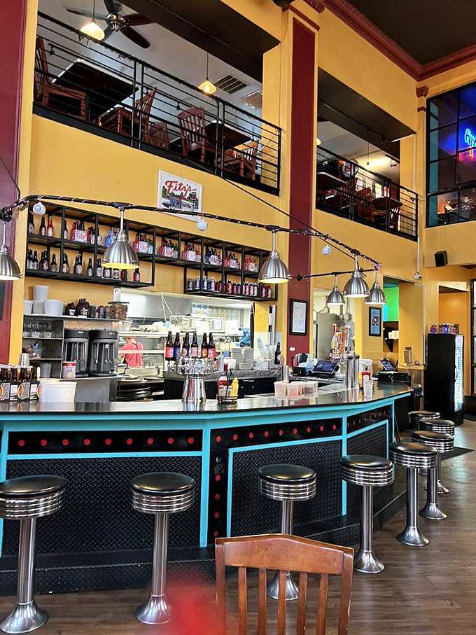 The retro-cool counter with chrome stools and turquoise accents feels like a time machine to a more delicious era of American dining.
