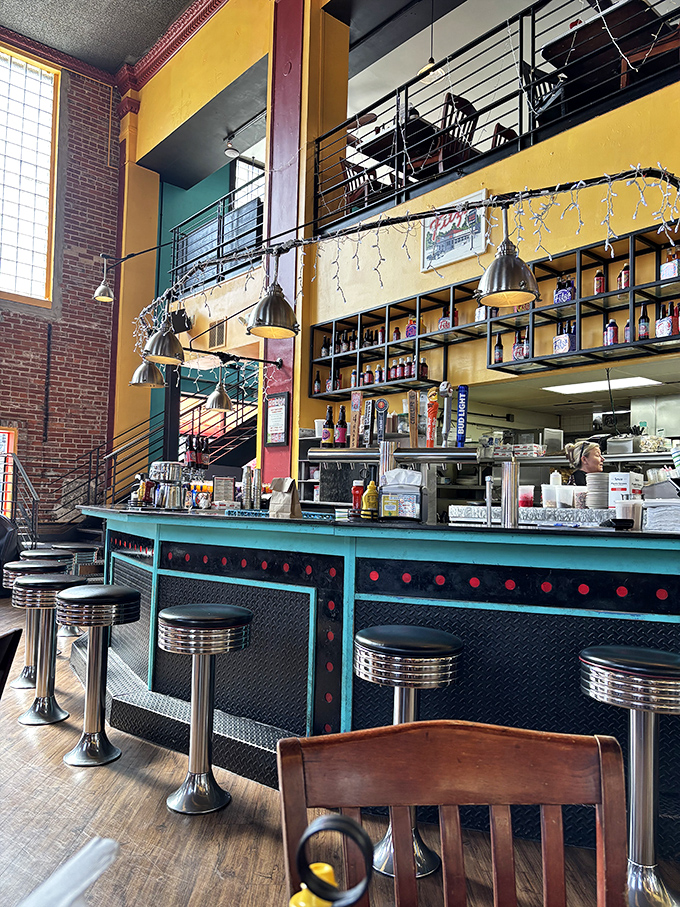 The retro-cool bar area with classic diner stools invites you to belly up and watch the culinary show unfold. Dinner and a show, St. Louis style!