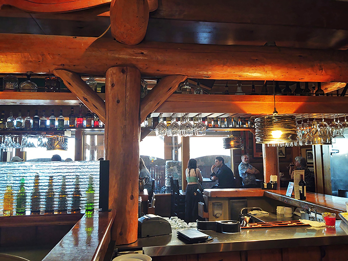 The bar area balances rustic charm with modern efficiency&mdash;where mountain lodge aesthetics meet perfectly chilled martinis.