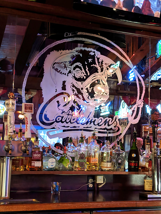 The bar at Cattlemens isn't just serving drinks; it's dispensing liquid hospitality with a side of Western charm.