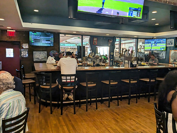 Where sports on TV and spirits behind the bar create the perfect backdrop for post-chicken relaxation. The curved bar invites conversation.