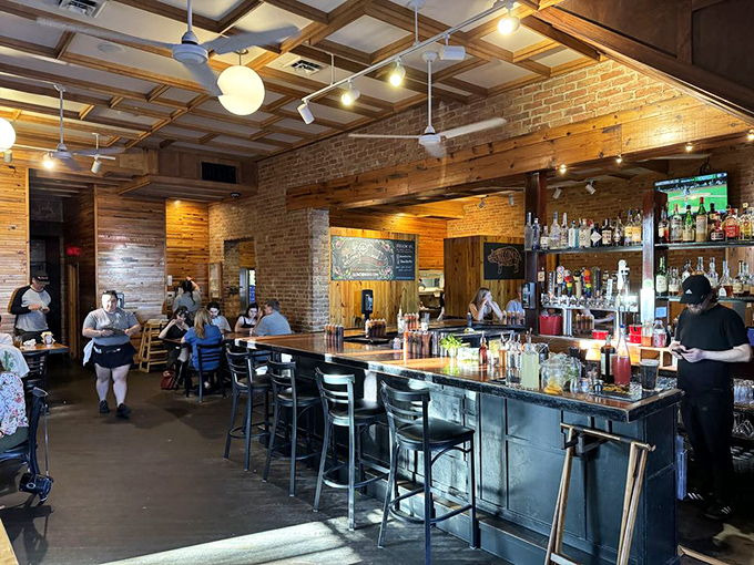 The bar at Slows—where craft beer flows as freely as barbecue opinions, and both are equally welcome.