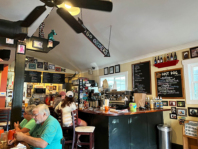 Every inch of wall space tells a story, while the ceiling fan lazily spins overhead like it's on island time too.