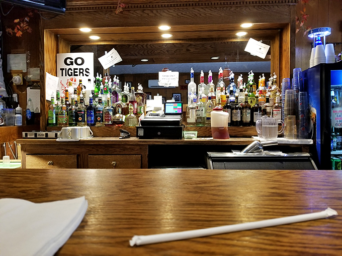 At the heart of this small-town bar, the counter tells its own story&mdash;lined with bottles of every kind.