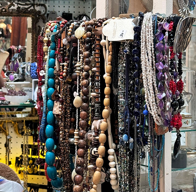 A rainbow of beads cascades like a tactile waterfall&mdash;turquoise, wood, and gemstone necklaces waiting to transform an outfit from ordinary to statement-making.