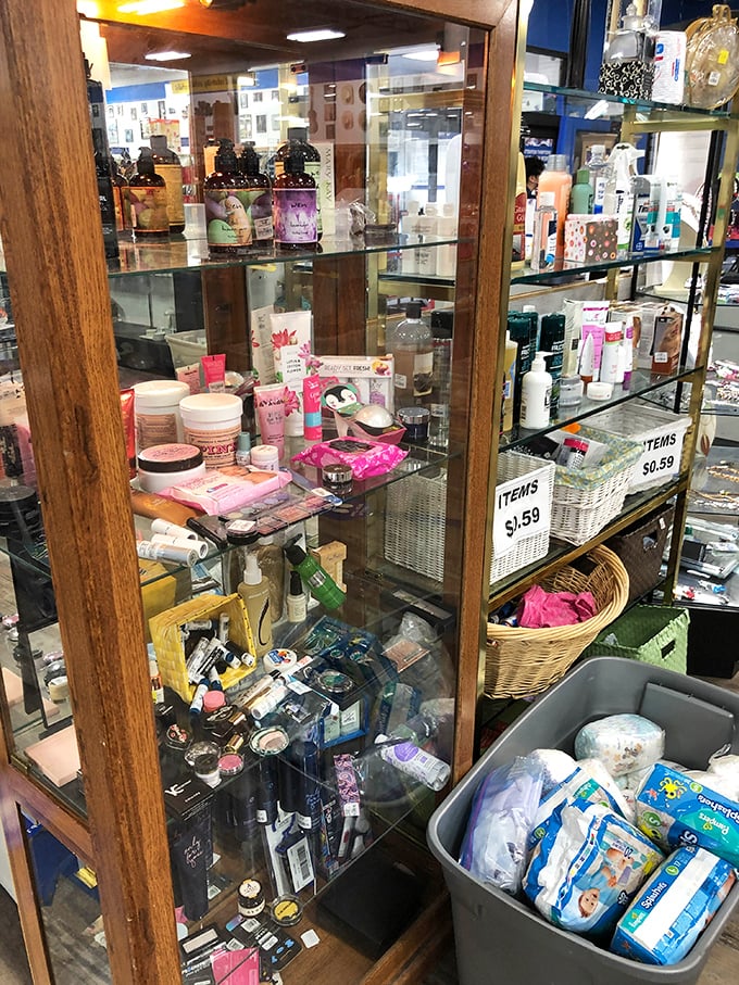 Beauty products and toiletries gather behind glass like tiny soldiers of self-care, most barely used and all priced for guilt-free experimentation.