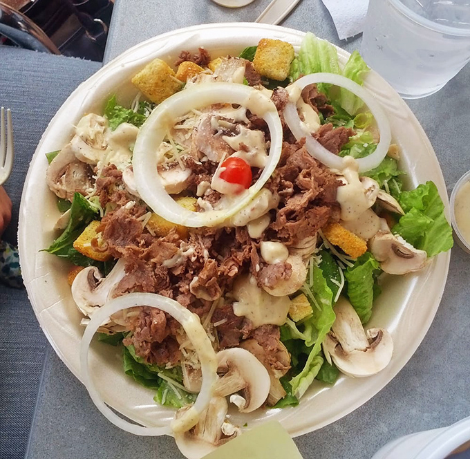 A salad substantial enough to satisfy even the most dedicated carnivore. Those rings of onion are like halos crowning this masterpiece of textures.