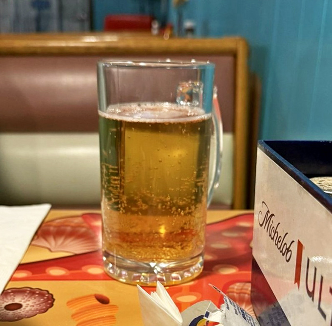 A cold beer in a frosty mug&mdash;because sometimes the perfect beverage pairing doesn't need to be complicated or come with a fancy name.