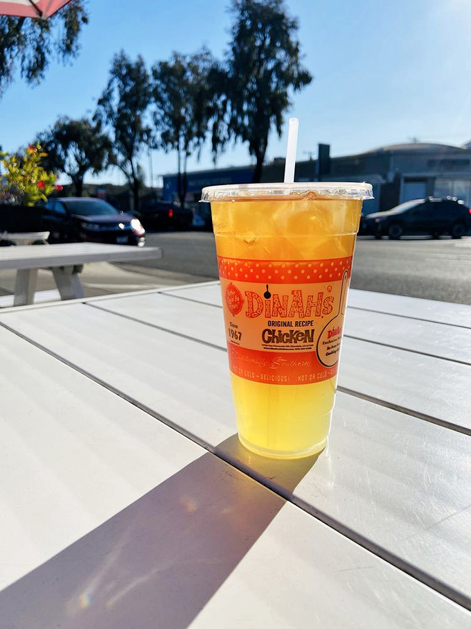 Sunshine in a cup! Dinah's branded iced tea sitting pretty on an outdoor table. The perfect companion for a chicken feast on a California afternoon.