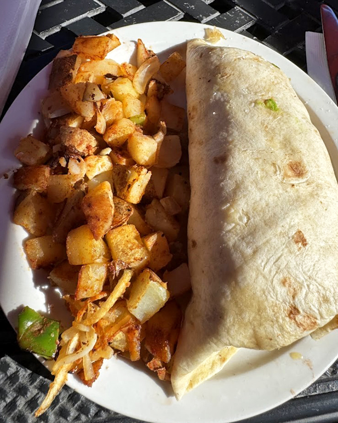 Breakfast burritos: where size definitely matters. This tortilla-wrapped treasure with crispy potatoes could fuel a morning surf session or cure any hangover.