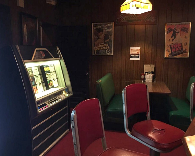 The jukebox stands guard like a musical time machine, ready to transport you back to whatever decade your heart desires.