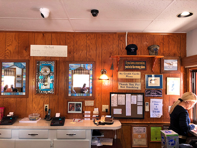 No fancy digital displays or neon signs here—just the warm glow of old Florida hospitality and a gentle reminder: cash only, friends.