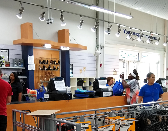 The checkout area: where victory dances happen and staff witness daily moments of thrifting triumph.