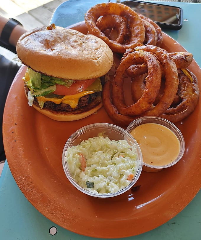 The all-American classic done right&mdash;a juicy cheeseburger with those glorious onion rings that somehow manage to be both crispy and tender at once.