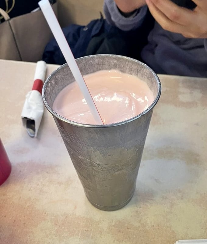 A milkshake so thick the straw stands at attention&mdash;part dessert, part beverage, all indulgence in a frosty metal cup.