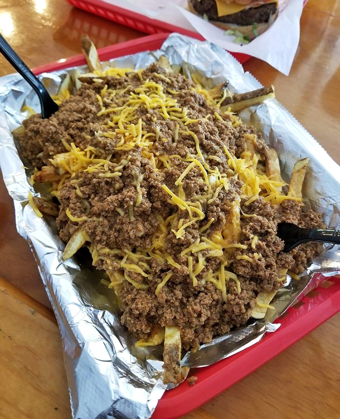 Chili cheese fries that require both a fork and a moment of silent appreciation&mdash;the ultimate shareable that nobody actually wants to share.