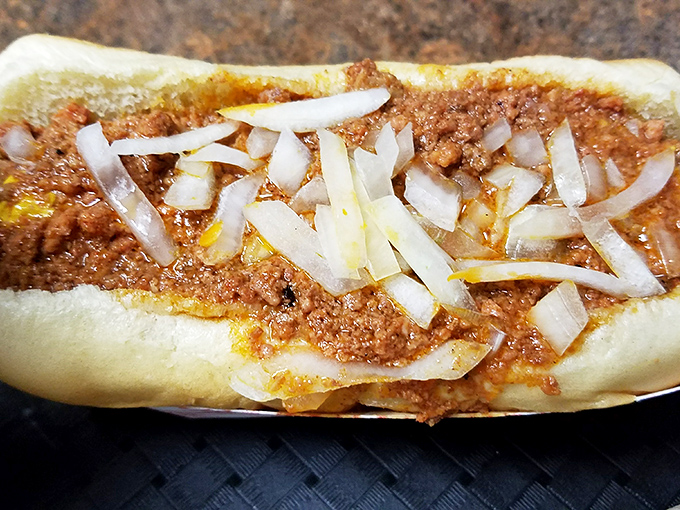 The chili dog&mdash;proof that sometimes the simplest pleasures are the most satisfying. Those diced onions add the perfect crunch.