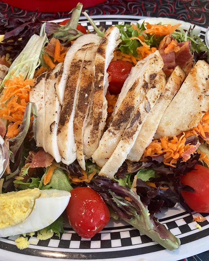 This isn't just a salad&mdash;it's a protein-packed landscape where grilled chicken, fresh vegetables, and hard-boiled egg create a nutritious escape route from burger guilt.