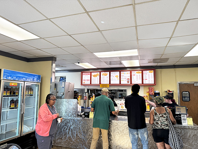 Where chicken dreams come true—the counter where friendly faces take your order and life-changing meals begin their journey to your table.