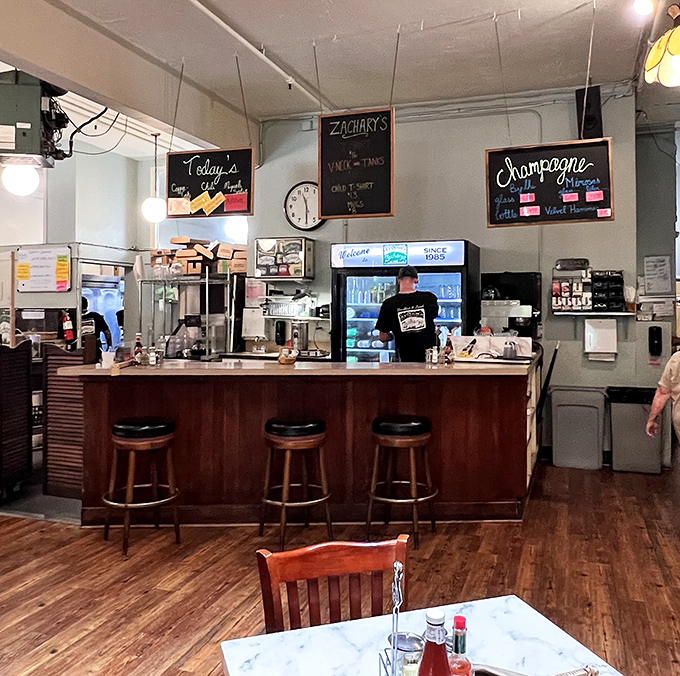 The counter where breakfast dreams come true, complete with chalkboard specials that change with the chef's whims and seasonal inspirations.