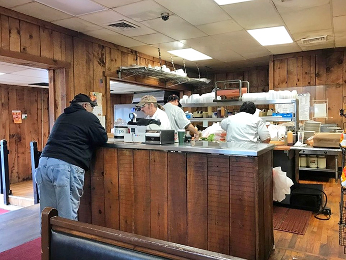 The counter – where sandwich dreams become reality. This is the stage where lunch performers have been perfecting their craft for decades.