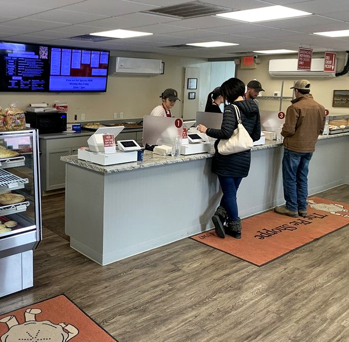 The modern counter area proves The Pie Shoppe has evolved with the times while keeping its soul firmly rooted in traditional baking excellence.