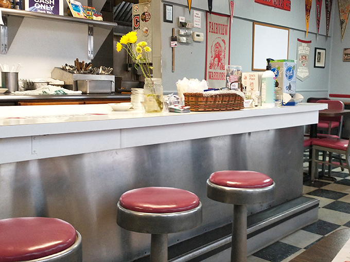 Counter seating: where strangers become friends over coffee refills and the shared religion of properly cooked eggs.
