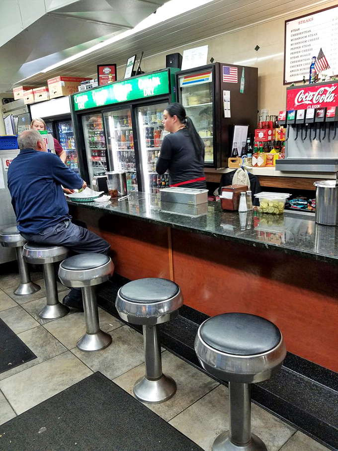 The diner counter&mdash;where regulars perch and newcomers learn the ropes. Those silver stools have heard decades of Philly stories.
