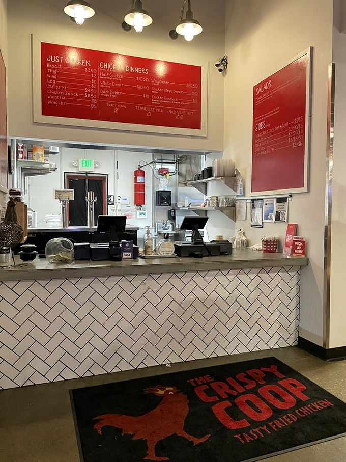 Order at this stylish counter where herringbone tile meets efficiency, and the aroma of frying chicken makes patience nearly impossible.