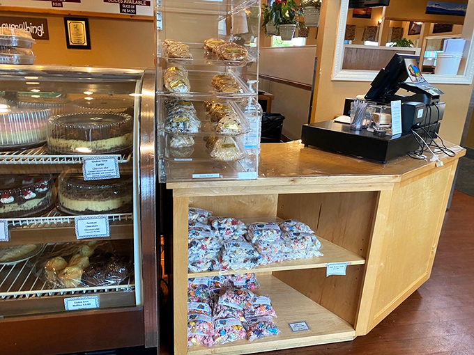 At the counter, dessert dreams become reality as pies, cakes, and pastries await their forever homes in takeout boxes.