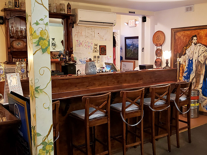 The bar area invites you to pull up a stool and stay awhile. Notice the hand-painted columns&mdash;little touches that show someone really cares.