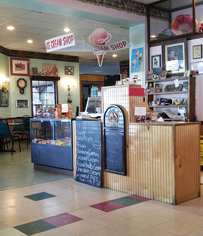 Chef figurines and an eagle stand guard at the counter, unofficial mascots overseeing decades of hometown dining traditions.