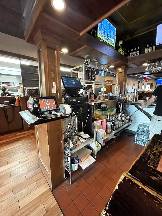 Behind-the-scenes magic: Where orders transform from scribbles to platters of joy. The unsung heroes work their craft in organized chaos.