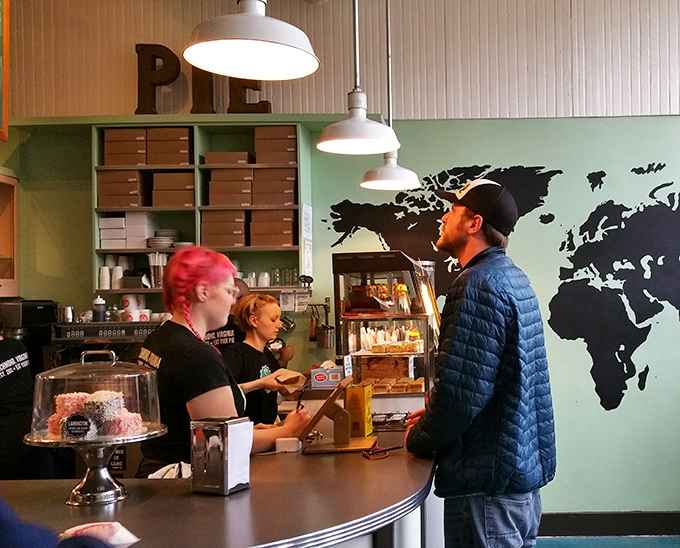 The world map wall art isn't just decoration&mdash;it's a promise that these pies will take your taste buds on an international journey without passport requirements.