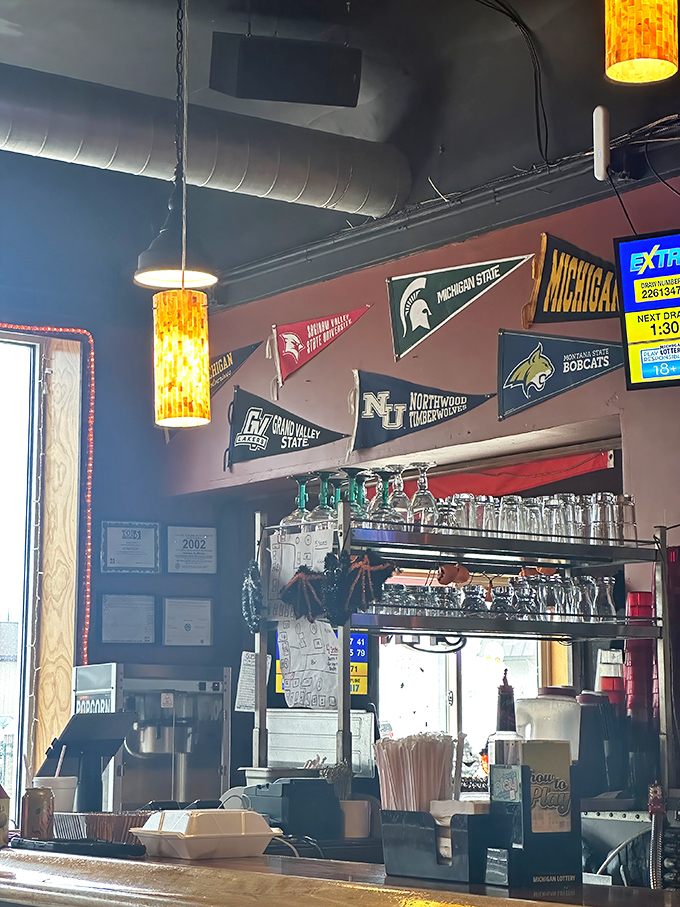 College pennants and local pride adorn the walls, creating that perfect "everybody knows your team" atmosphere that makes sports fans feel right at home.