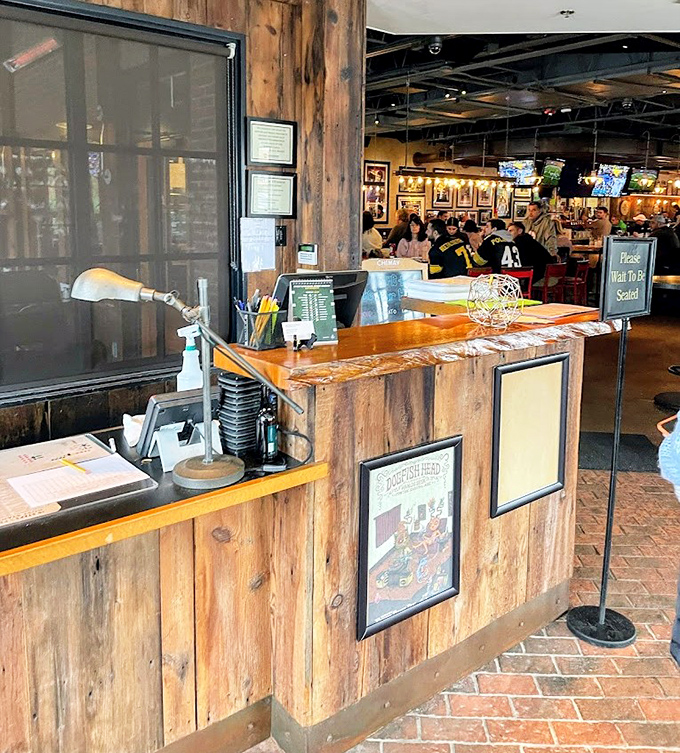 The host stand welcomes you with rustic charm&mdash;the wooden panels and brick floor setting the tone for the unpretentious excellence that awaits inside.