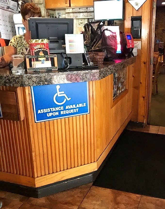 The counter where solo diners become philosophers and coffee cups never stay empty long.