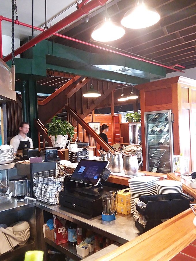 Behind the scenes magic happens here, where plates stack high and staff orchestrate your dining experience with the precision of a well-rehearsed symphony.