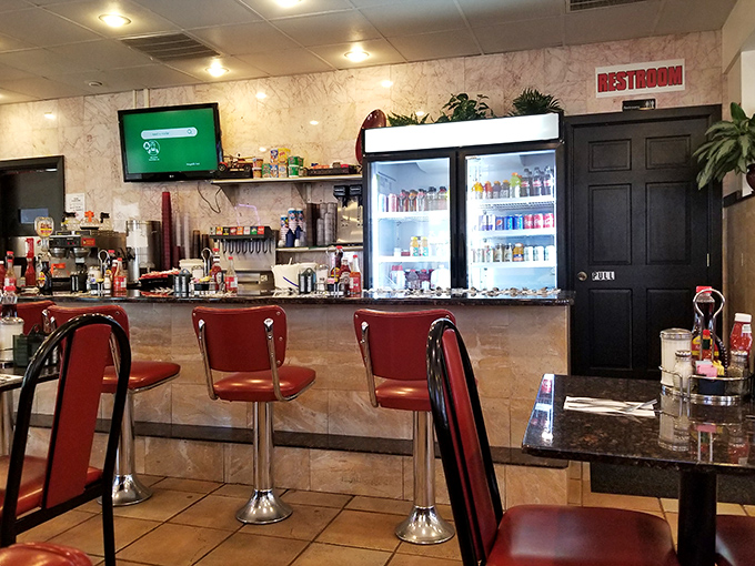 The beating heart of any great diner &ndash; a counter where strangers become friends over coffee refills.